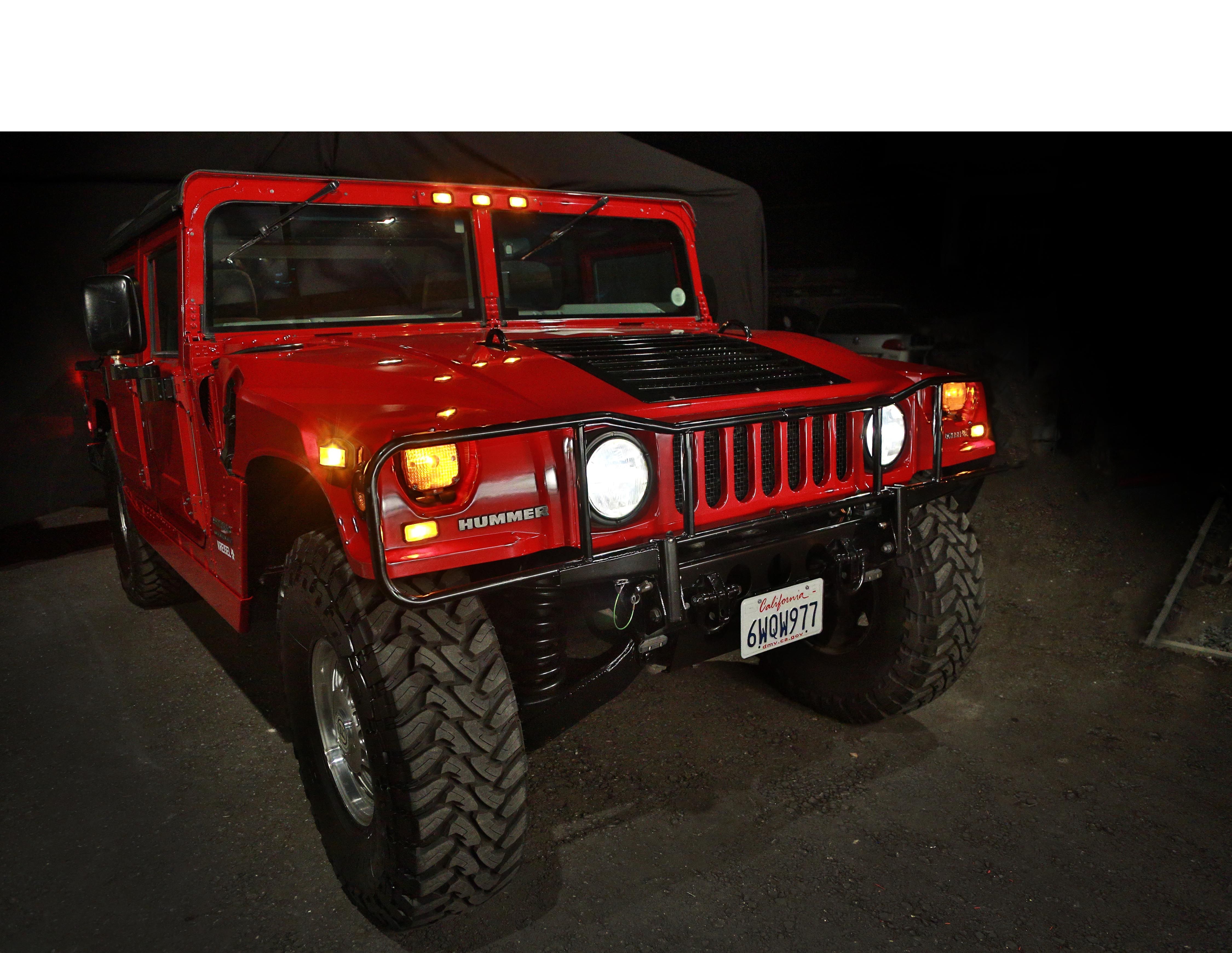 Arnold Schwarzenegger unveils world’s first electric Hummer | Autocar ...